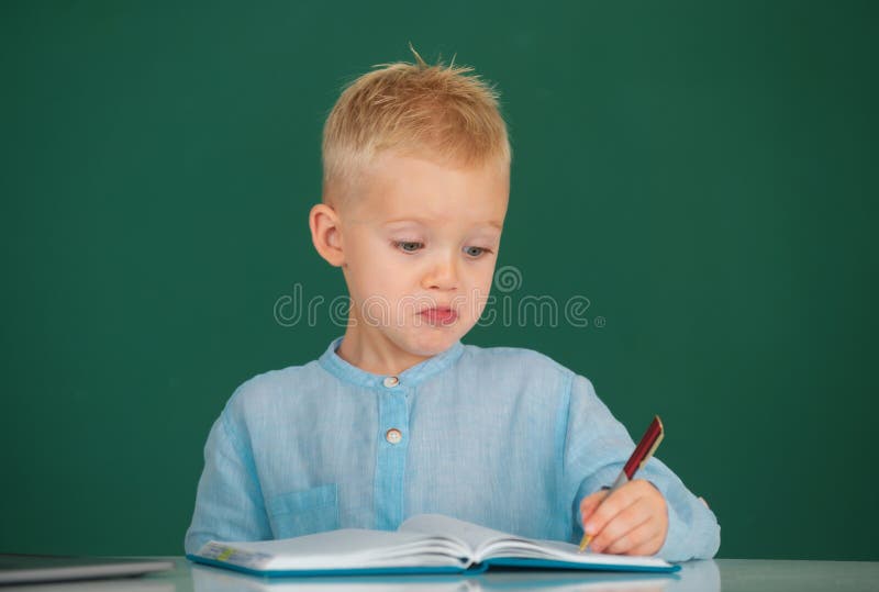 Kid Writing in Notebook in Class. Back To School Stock Photo - Image of ...