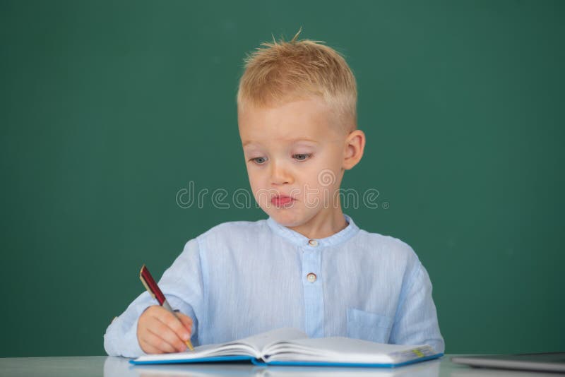 Kid Writing in Notebook in Class. Back To School Stock Photo - Image of ...