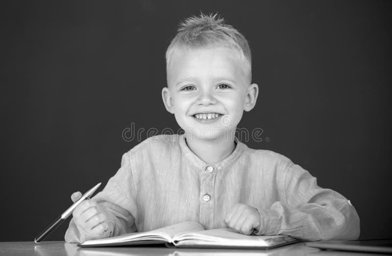 Elementary School Kid Holding Laptop on Head in Computer Class. Stock ...