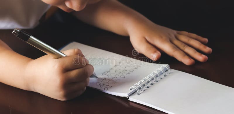 Kid Writing Number on Notebook Stock Photo - Image of math, learning ...