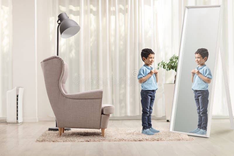 Kide Putting Clothes in Front of a Mirror Stock Image - Image of look ...
