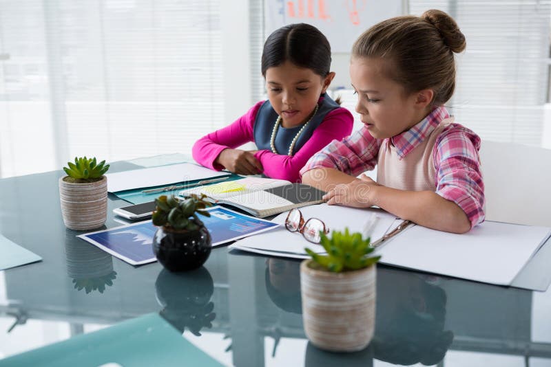 Kids As Business Executive Reading Book Stock Photo - Image of ...