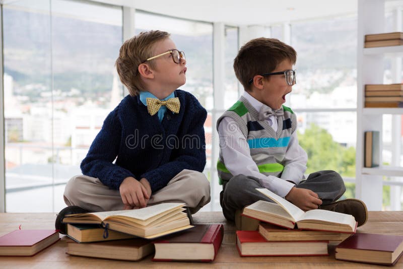 Kids As Business Executive Sitting on a Table Stock Photo - Image of ...