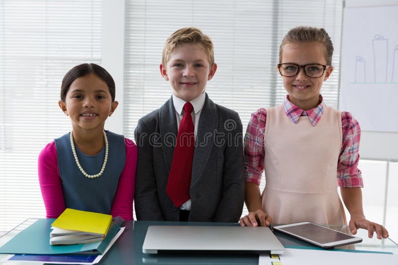 Kids As Business Executive Smiling while Standing in the Office Stock ...