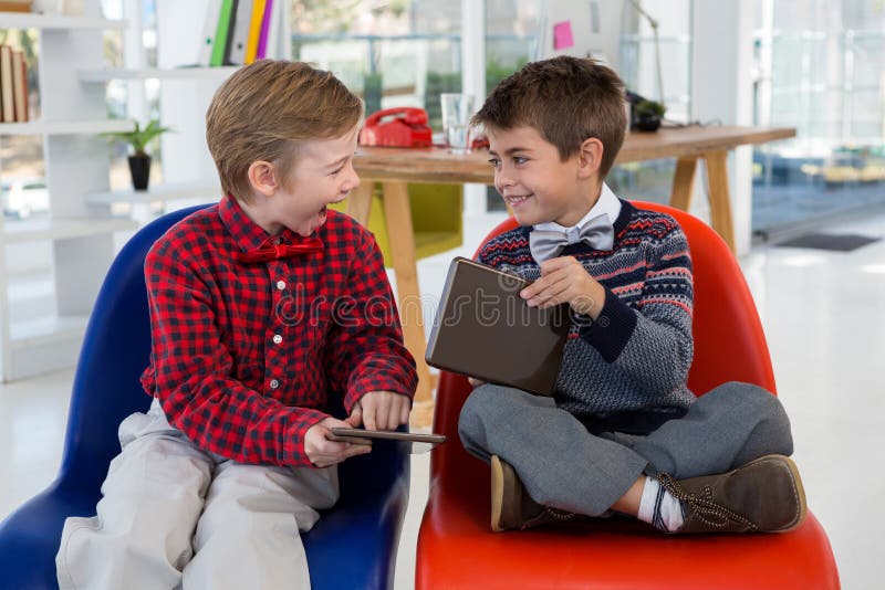 Kids Interacting with Each Other in Library Stock Photo - Image of ...