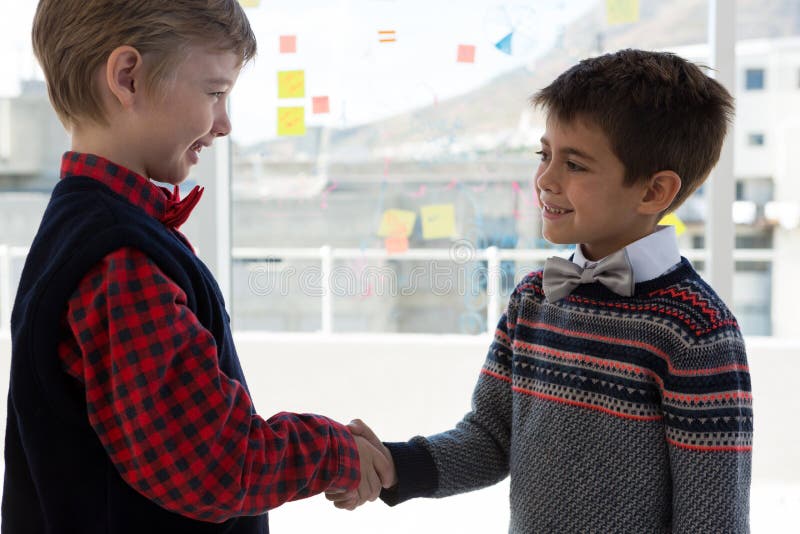 152 Kids Shaking Hands Stock Photos - Free & Royalty-Free Stock Photos ...