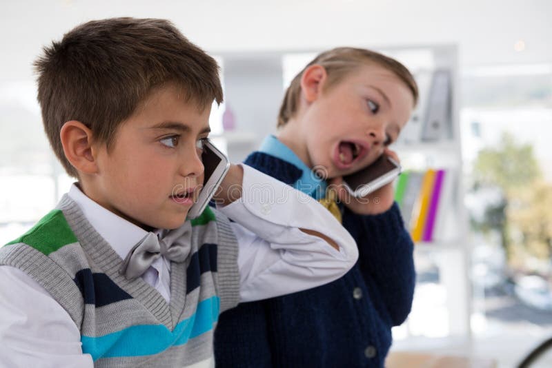 Kids As Business Executives Talking on Mobile Phone Stock Image - Image ...
