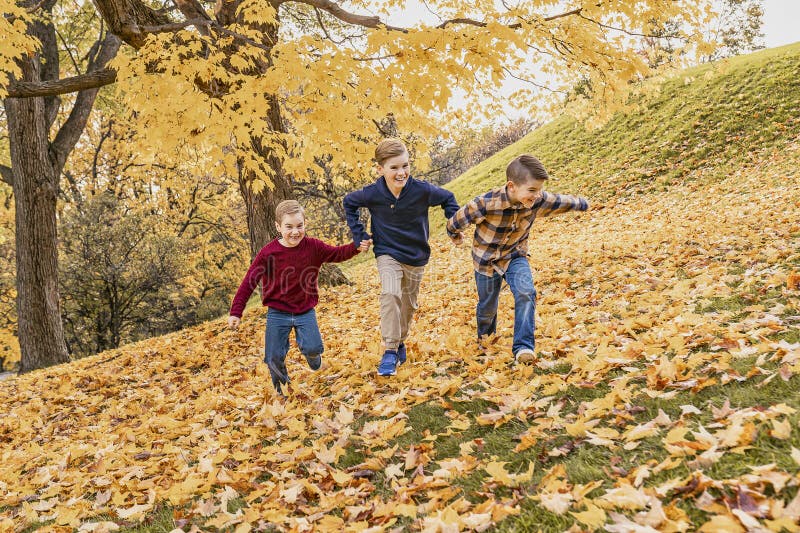 Kids in Autumn Forest Having Great Time Together Stock Image - Image of ...