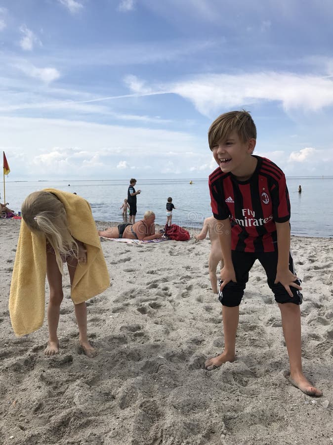 Kids on the beach editorial photography. Image of summer - 114216152