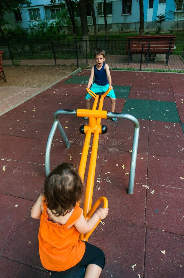 Kids Bouncing in Playground Stock Photo - Image of children, bouncing ...