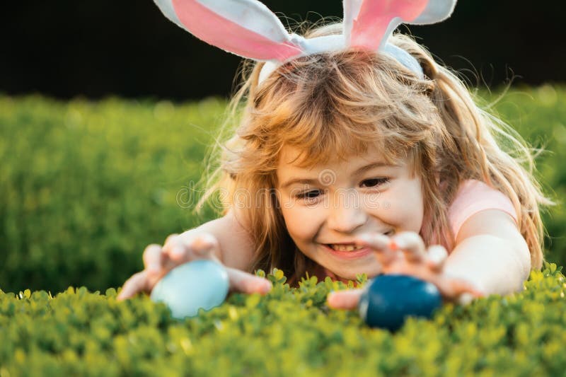 Kids Boy Hunting Easter Eggs. Child with Easter Eggs and Bunny Ears ...