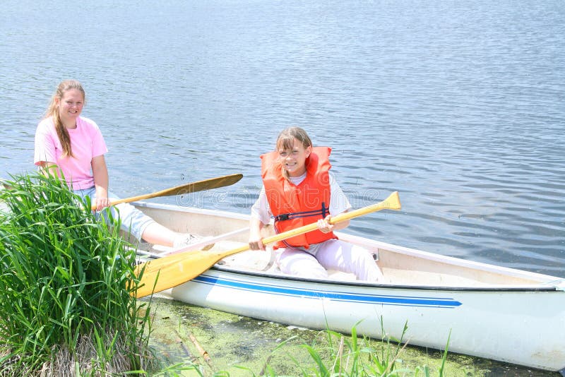 Kids in canoe. stock image. Image of summer, bright, girls - 9613389
