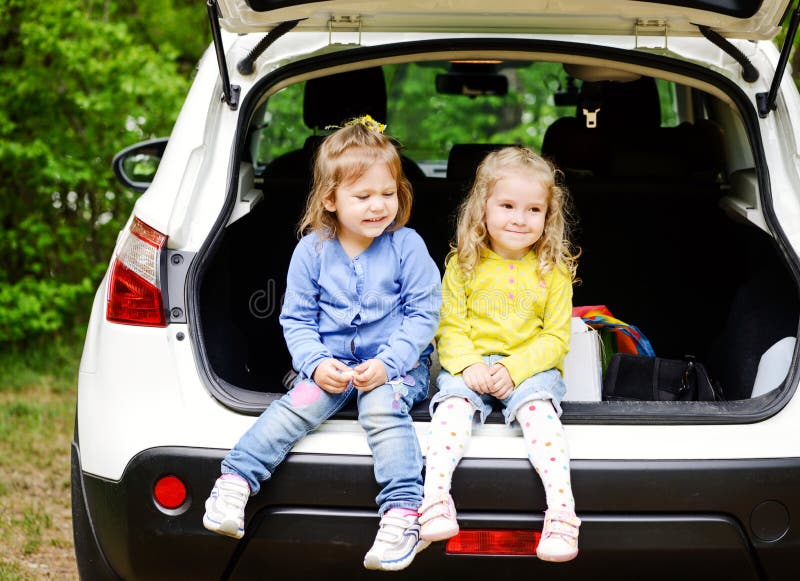 Kids in the car stock photo. Image of laughing, ride - 142575220