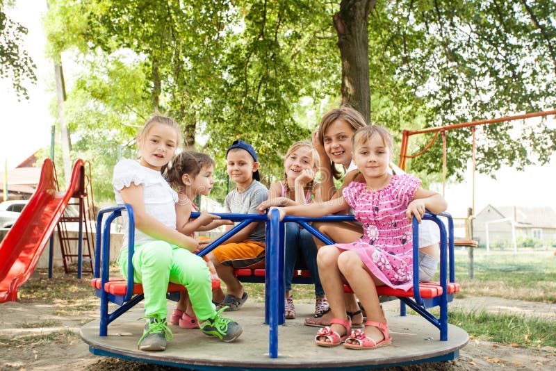 Kids on the carousel stock image. Image of motion, sisters - 106164773