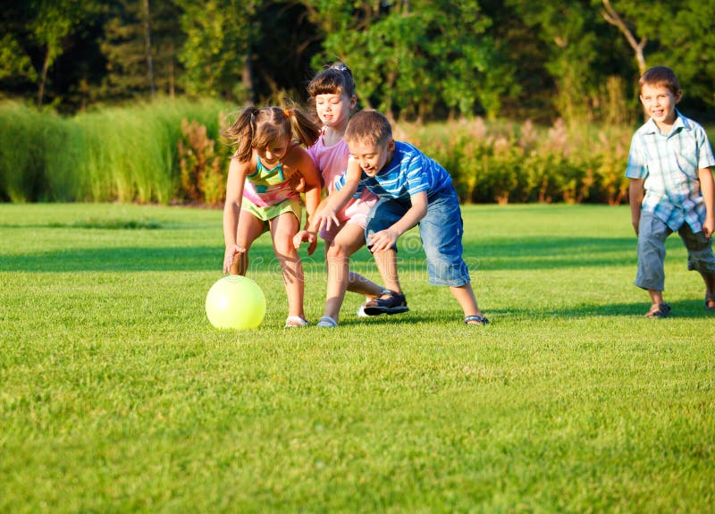 Kids Group Playing with Ball Stock Photo - Image of healthy, girl: 19151718