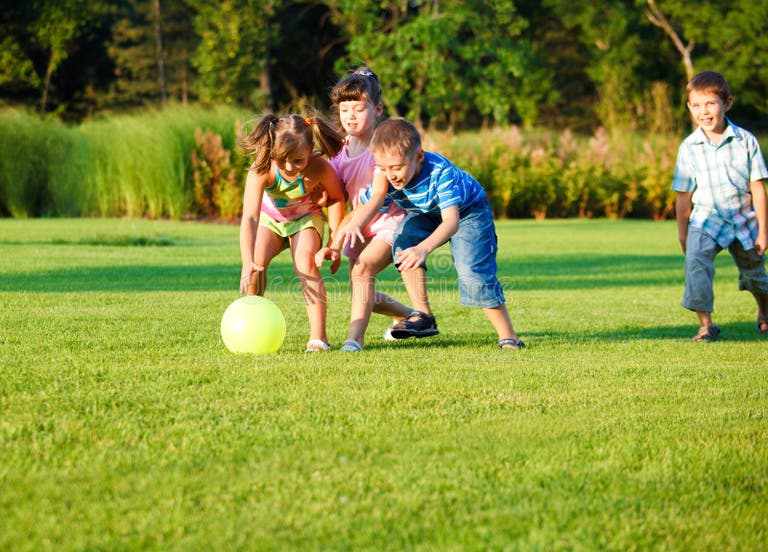 Kids catching the ball stock photo. Image of kids, ball - 17776370