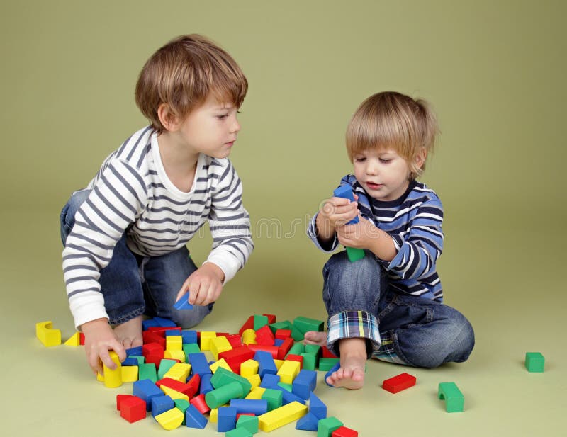 Children Sharing Blocks