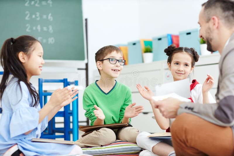 Kids clapping hands stock image. Image of altogether - 110144667