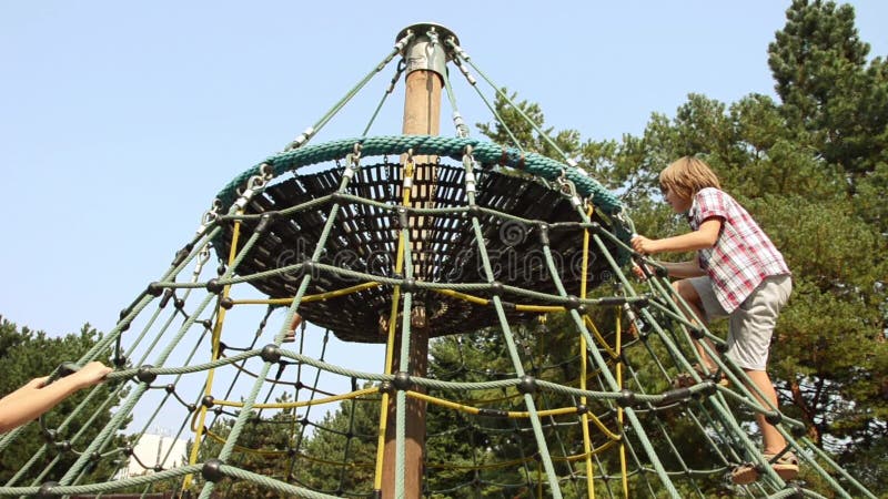 Kids Climb on Rope Lattice at Playground Stock Footage - Video of park ...