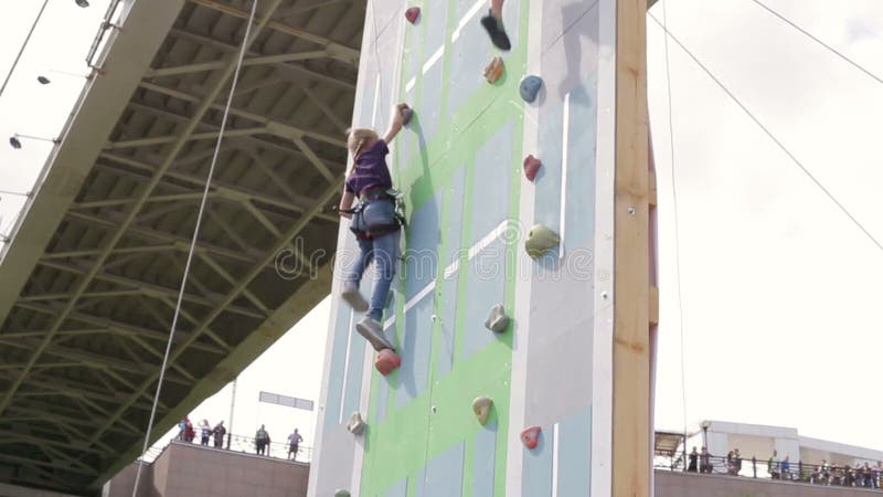 Kids Climbing Rock Wall while Climbing Competition Stock Footage ...