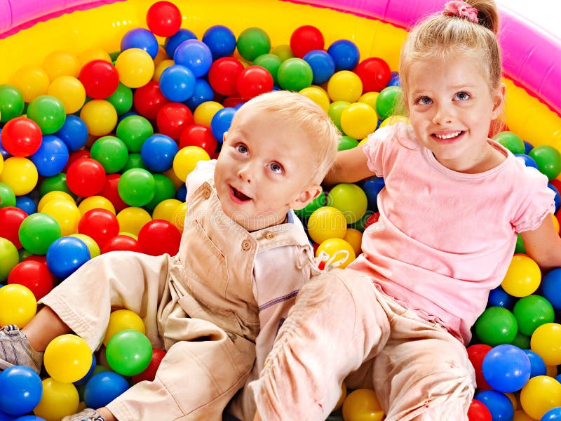 Kids in colored ball. stock photo. Image of colorful - 27184150