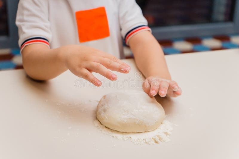 The Child Cooks. Hands Concoct Dough and Flour Stock Photo - Image of ...