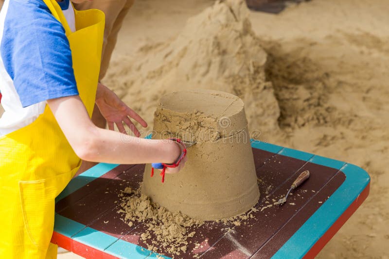 Sand Castle Made by Kids on a Craft Lesson on Beach Stock Image - Image ...