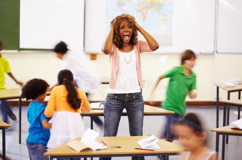 Kids Create Chaos. a Young Teacher Screaming As Children Run Around the ... Kids Create Chaos. a Young Teacher Screaming As Children Run Around the ...