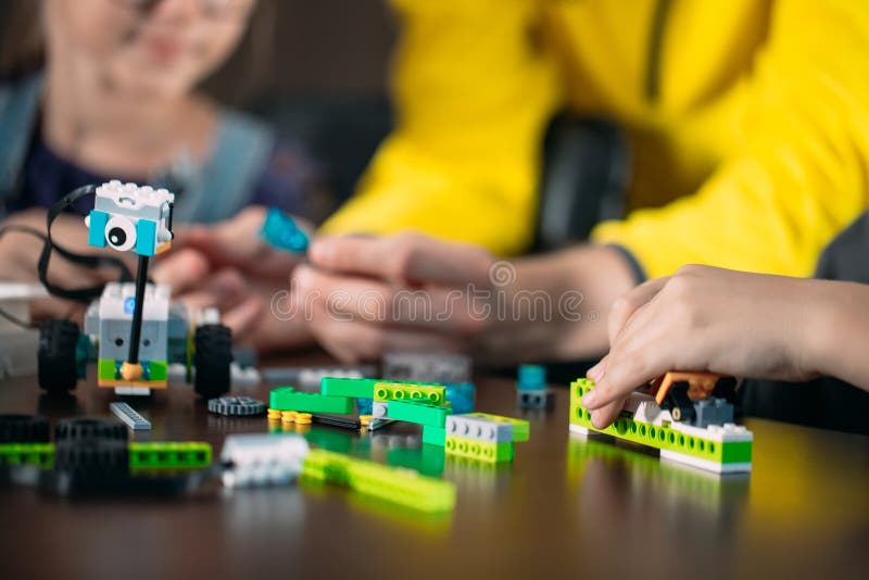 Kids Creating Robots with Teacher. Early Development, Diy, Innovation ...