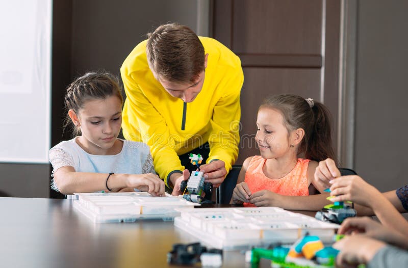 Kids Creating Robots with Teacher. Early Development, Diy, Innovation ...