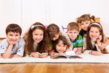 Kids crowd reading book stock image. Image of giggle - 18142147