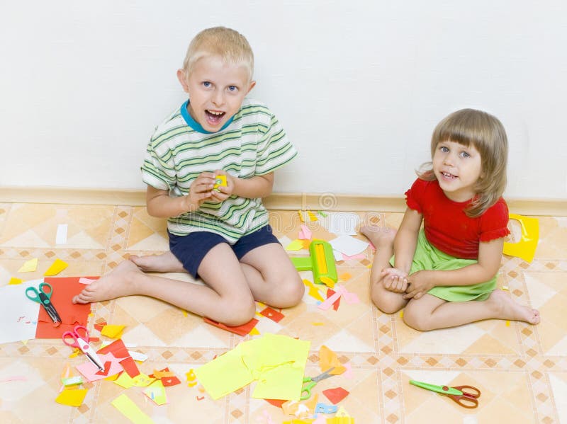 Kids cut the colored paper stock photo. Image of scattered - 14908832