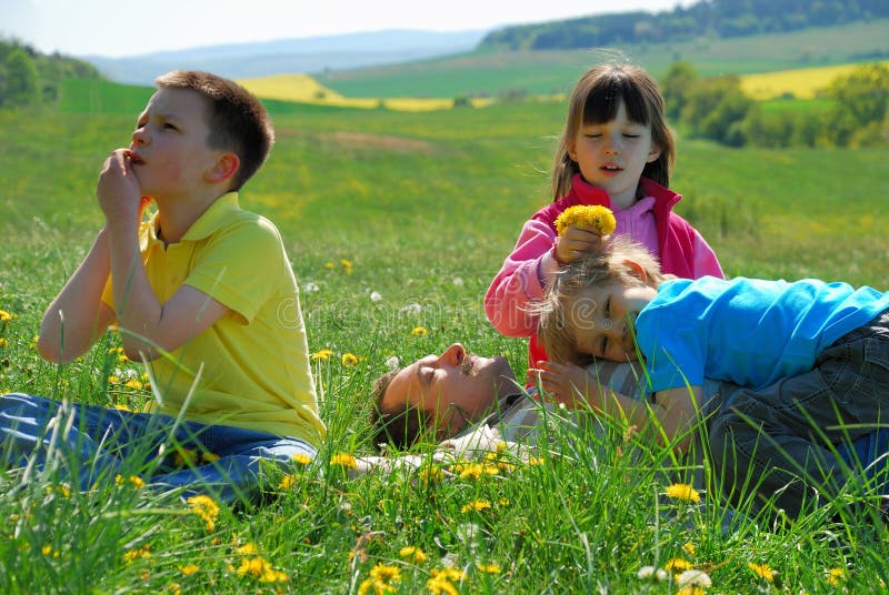 Kids with dad in meadow stock image. Image of child, kids - 2417999