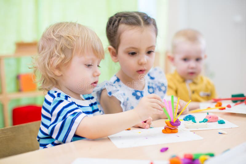 Kids Doing Arts and Crafts in Kindergarten Stock Photo - Image of ...
