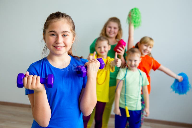 Kids doing exercises stock image. Image of group, health - 106698075