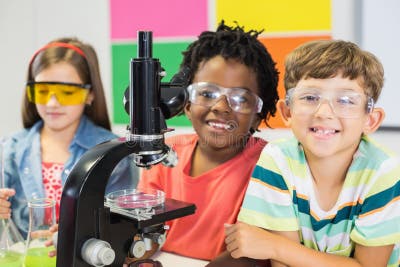 Kids Doing Experiment on Microscope in Laboratory Stock Image - Image ...