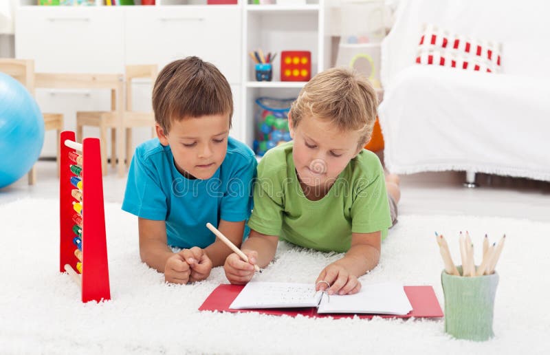 Kids Doing Math Exercises on the Floor Stock Image - Image of exercise ...