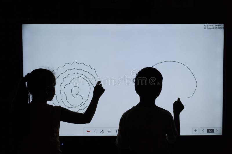Kids draw on a big screen editorial stock photo. Image of child - 177849768