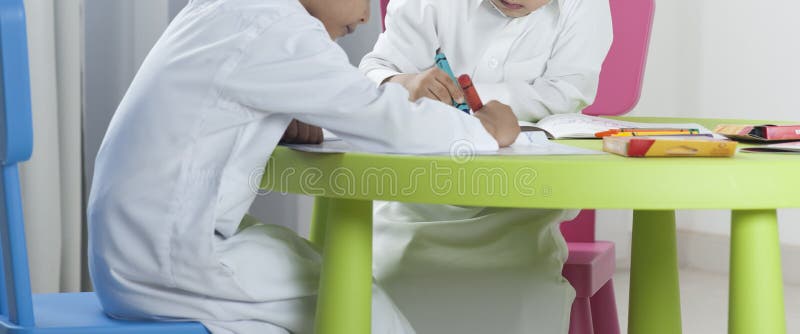 Kids Drawing with Colored Crayons at a Table Editorial Stock Image ...