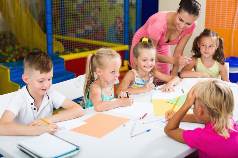 Kids Drawing on Lesson in Elementary School Class Stock Photo - Image ...