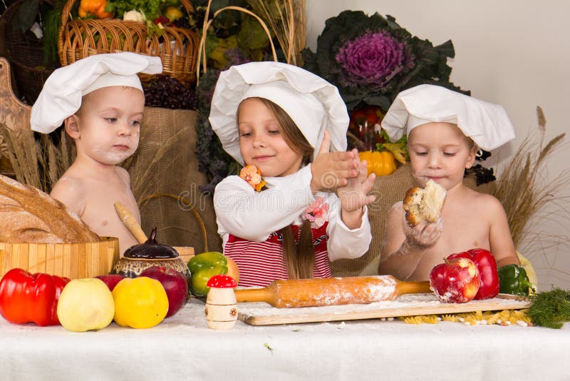 Kids Dressed As Chefs Cooking Stock Photo - Image of chef, apple: 22118400