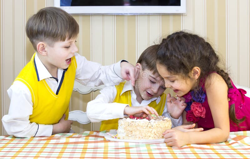 Kids eat cake stock image. Image of girl, group, garden - 37089659