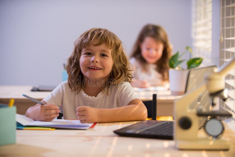 Kids Education and Study Concept. Primary School Student in Classroom ...