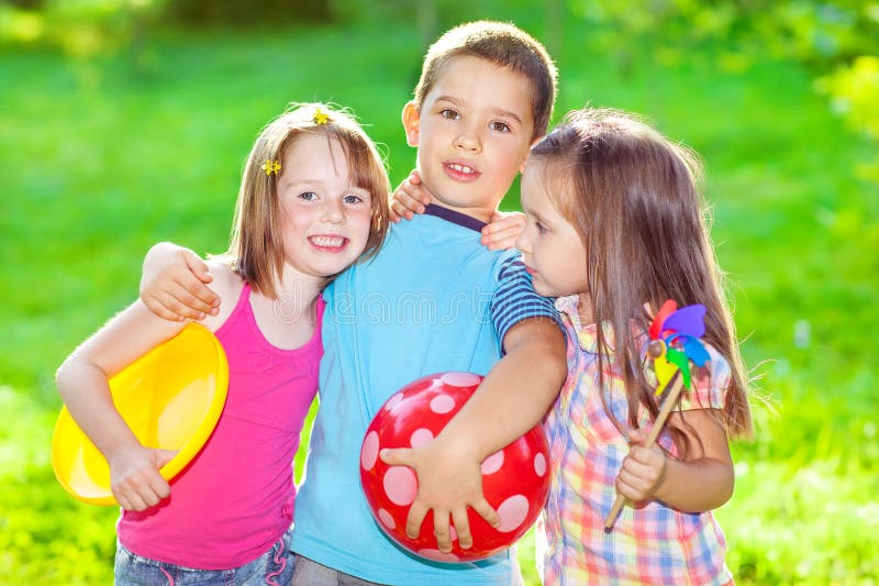 Kids embracing stock image. Image of group, friends, elementary - 32334605