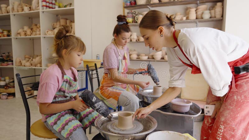 Children Learn Pottery Skills at a Creative Workshop in a Sunny Studio ...