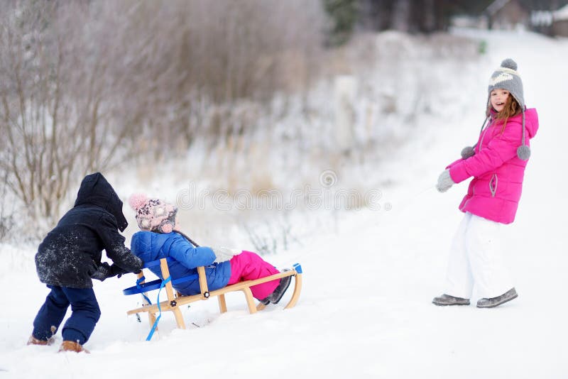 KIds Enjoying Sleight Ride on Winter Day Stock Image - Image of holiday ...