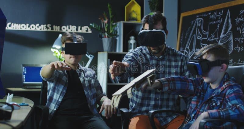 Kids Examining VR Technology in Laboratory Stock Photo - Image of ...