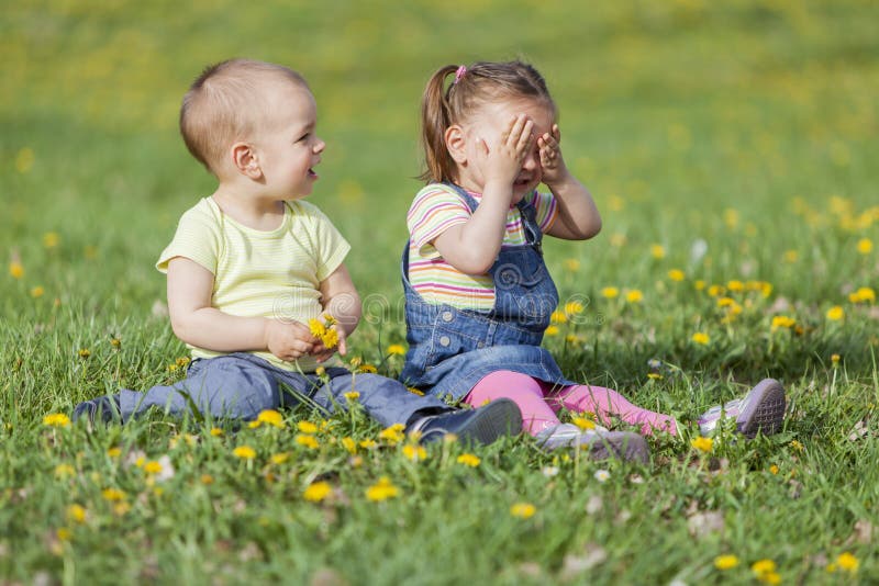 Kids in the field stock image. Image of female, human - 25564979