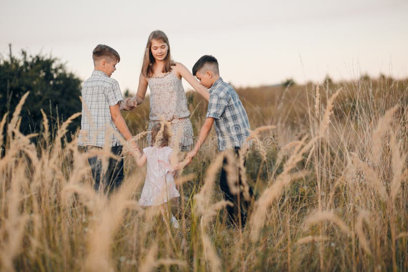 Kids in a field stock photo. Image of joyful, lifestyle - 123191248