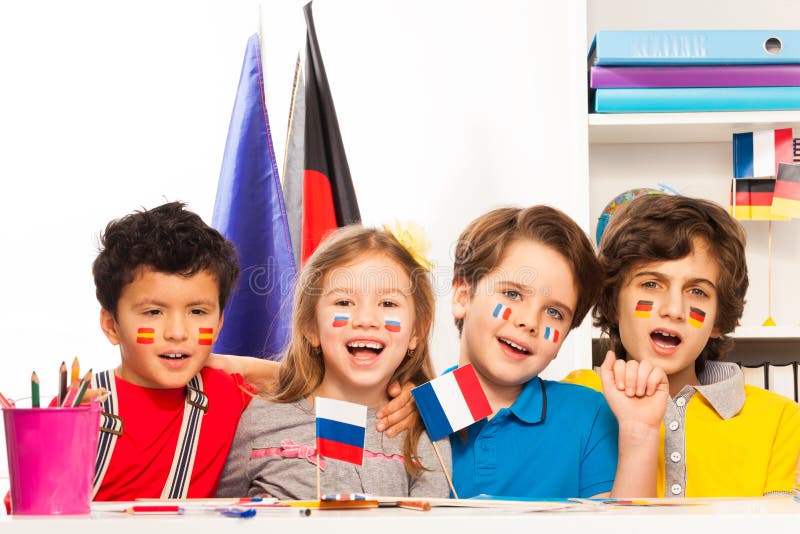 Kids With Flags On Cheeks Singing At The Classroom Stock Photo - Image ...